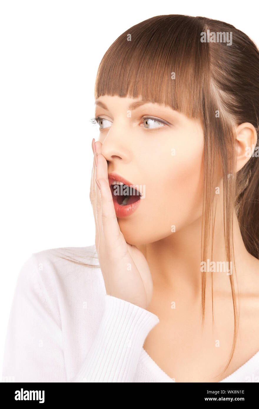 woman with hand over mouth Stock Photo - Alamy