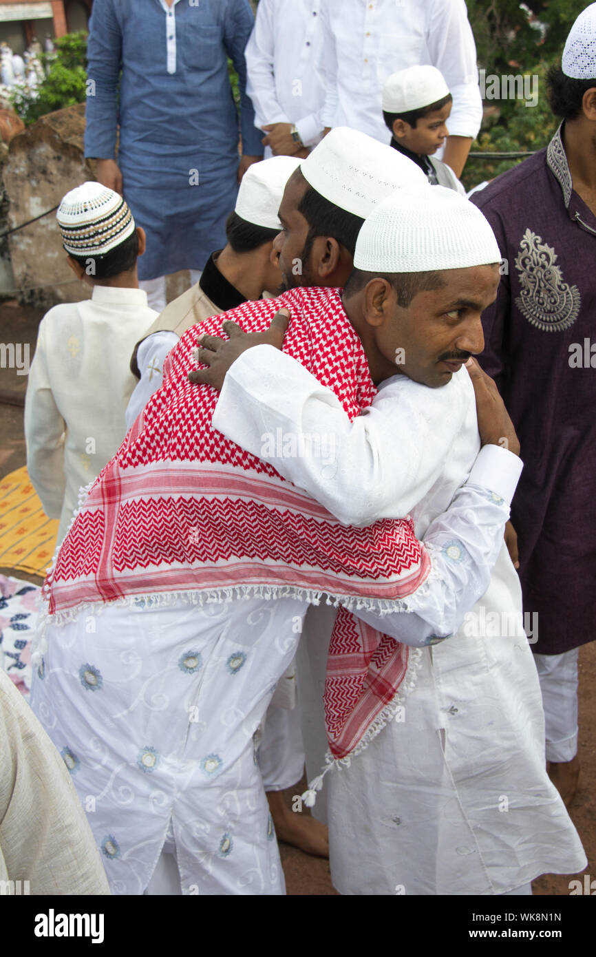 Muslim men hugging each other hi-res stock photography and images - Alamy