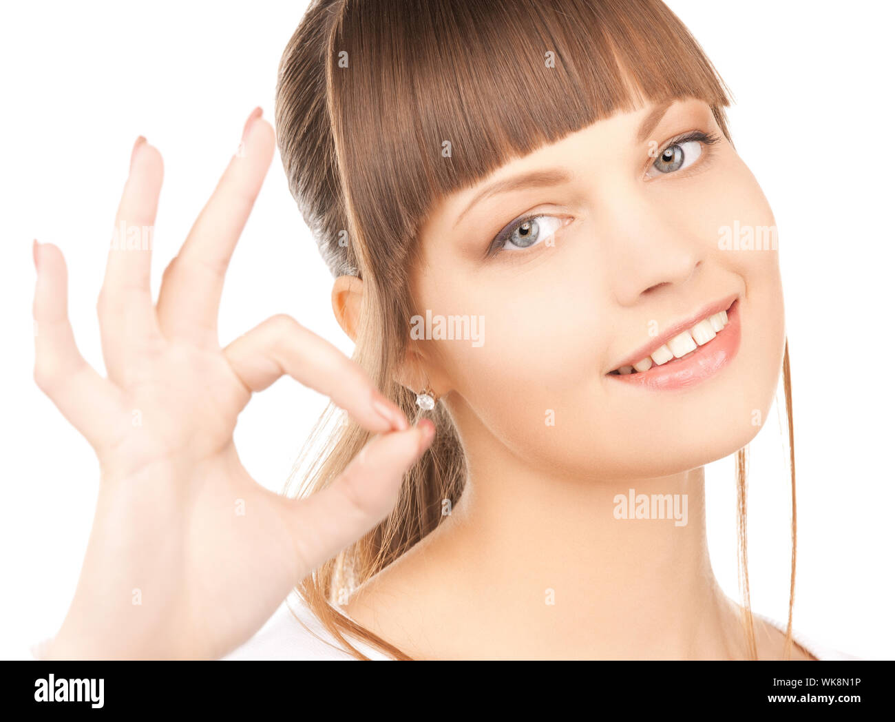 young woman showing ok sign Stock Photo - Alamy