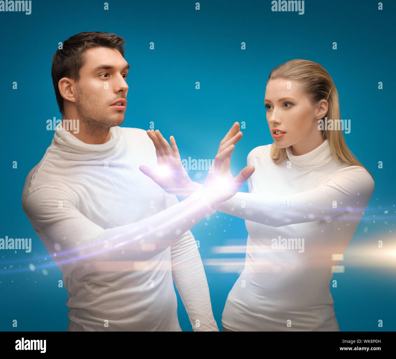picture of man and woman working with magic Stock Photo - Alamy