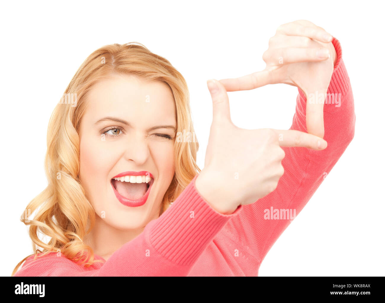 picture of excited woman creating a frame with fingers or snapshot ...