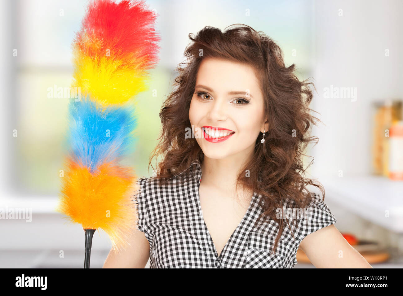 beautiful woman with cleaning sweep Stock Photo - Alamy