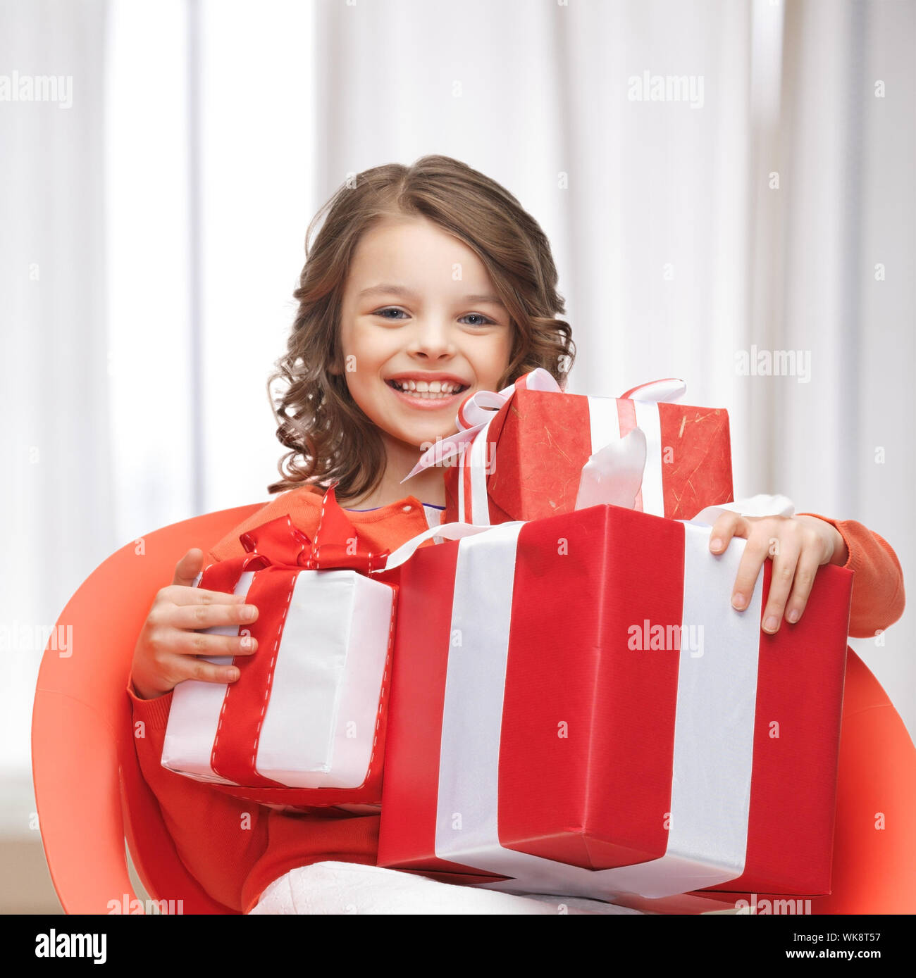 girl with gift boxes Stock Photo - Alamy