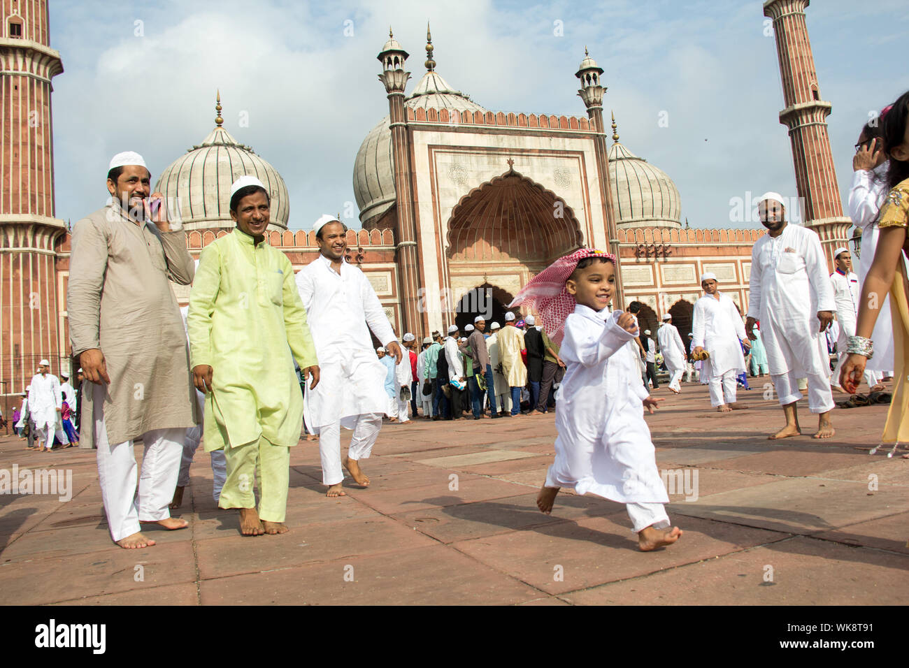 Group of people in courtyard of a masjid, Jama Masjid, Old Delhi, India ...