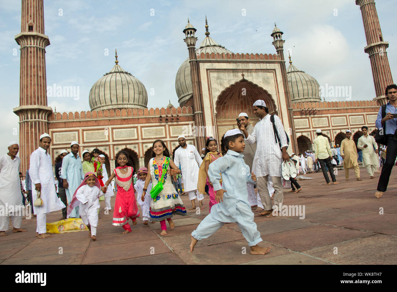 Group of people in courtyard of a masjid, Jama Masjid, Old Delhi, India ...