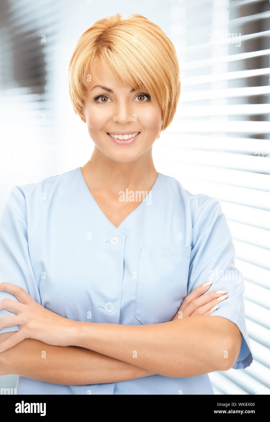 bright picture of attractive female doctor in hospital Stock Photo - Alamy