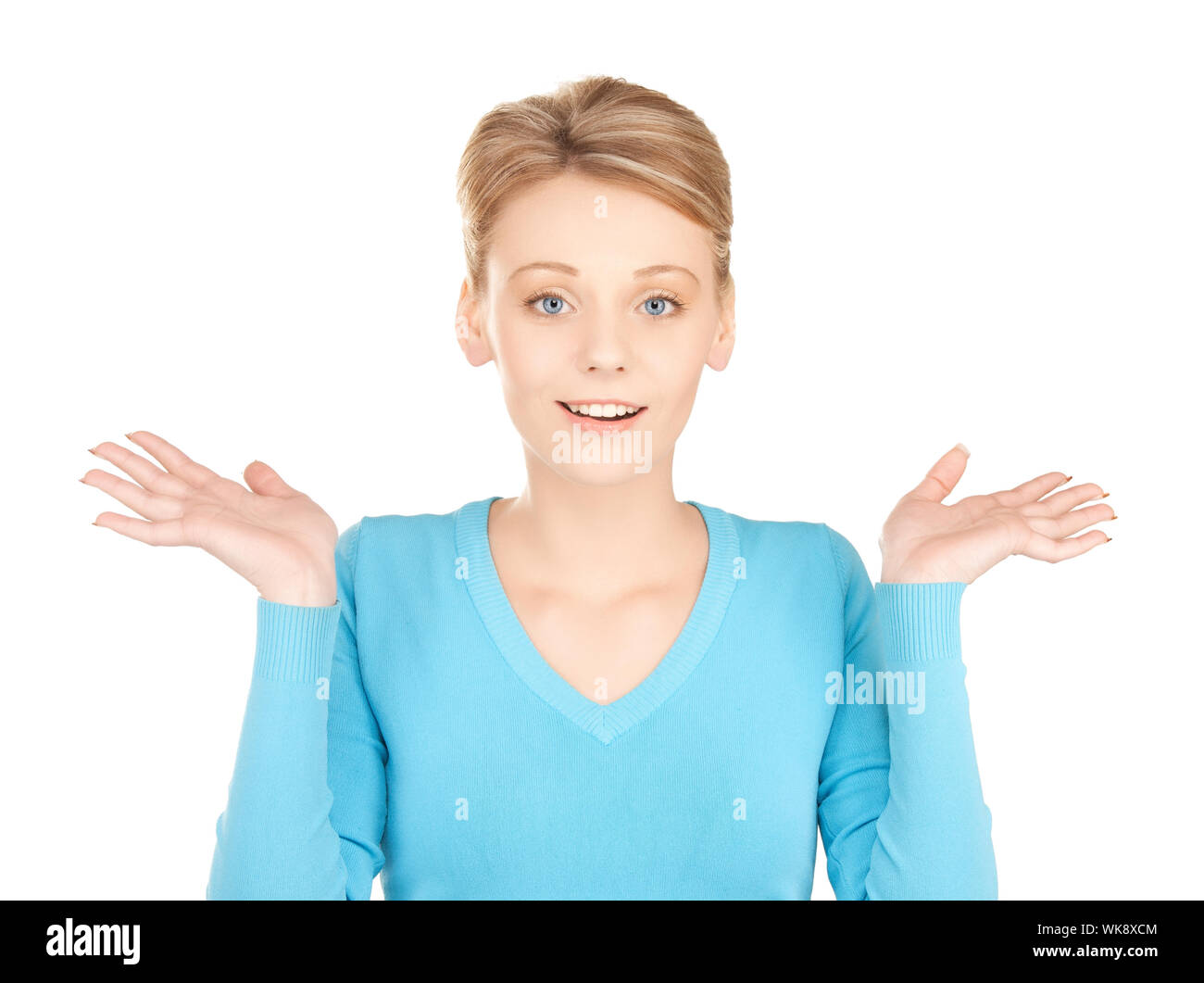 Smiling girl shrugging hi-res stock photography and images - Alamy