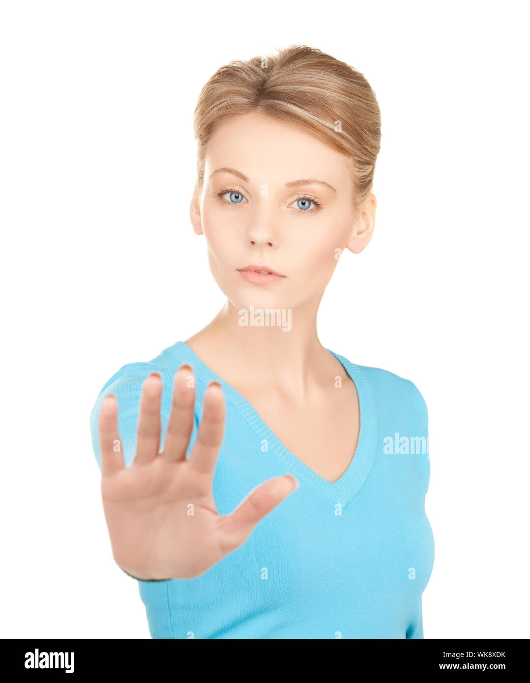 bright picture of young woman making stop gesture Stock Photo - Alamy