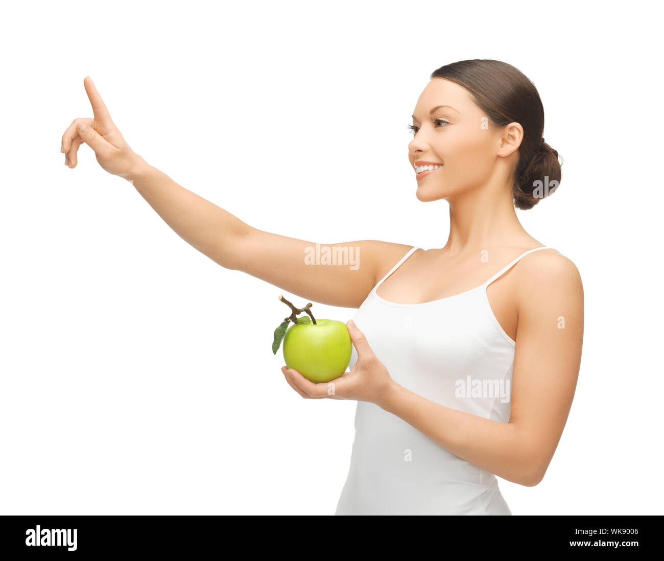 woman with green apple pointing her finger at something Stock Photo - Alamy