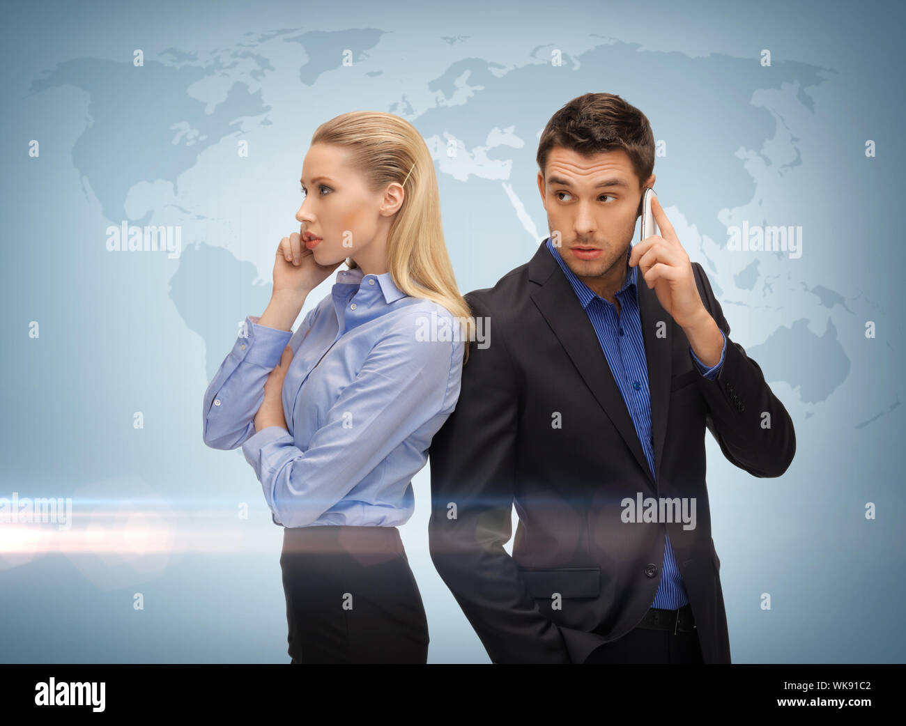 picture of man and woman with cell phones Stock Photo - Alamy