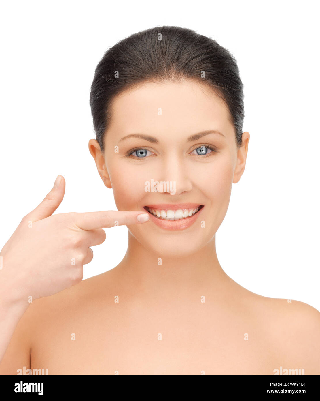 woman showing her teeth Stock Photo - Alamy