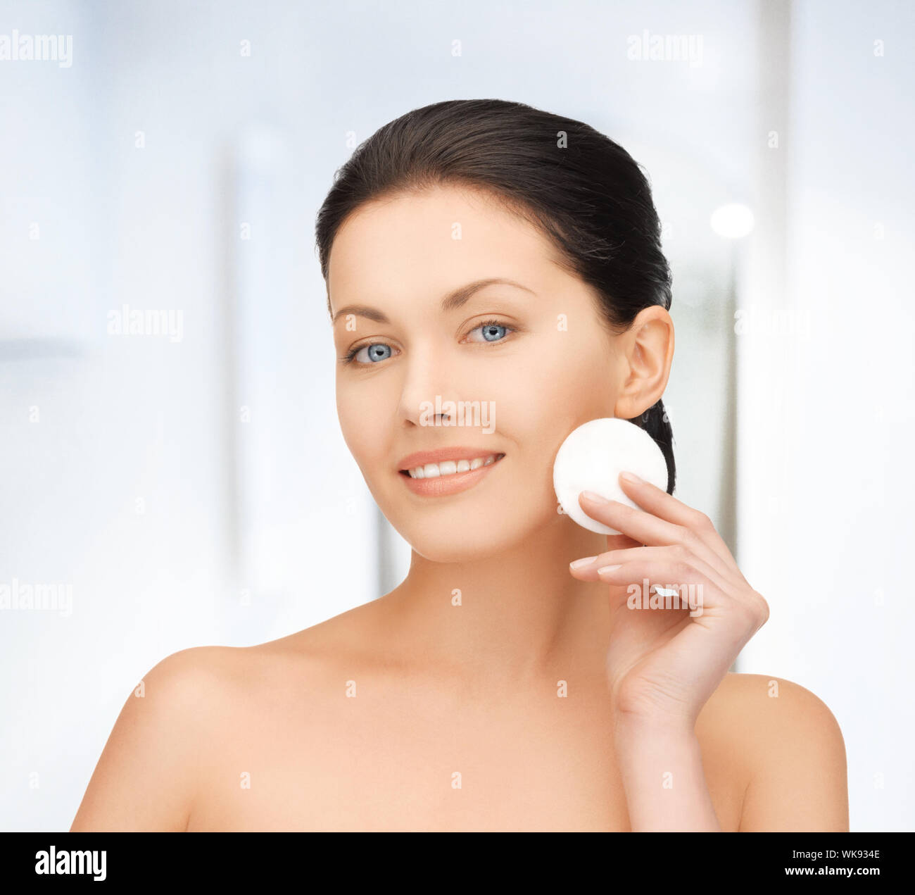 beautiful woman with cotton pad Stock Photo - Alamy