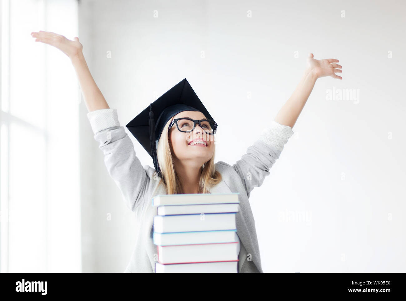 happy student in graduation cap Stock Photo - Alamy