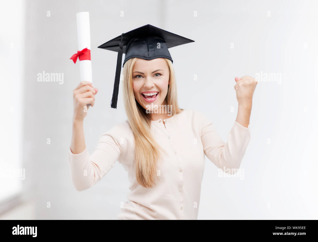 student in graduation cap with certificate Stock Photo - Alamy