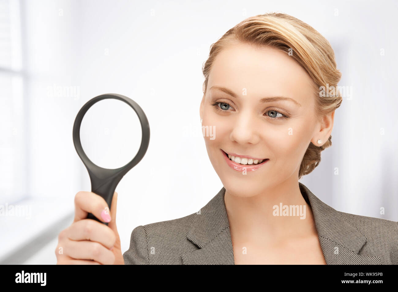 picture of beautiful woman with magnifying glass Stock Photo - Alamy
