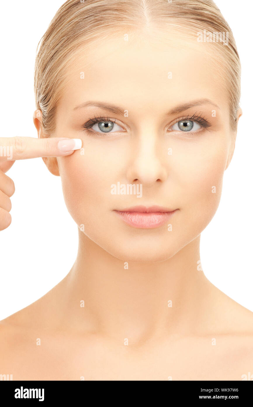 face of beautiful woman touching her eye area Stock Photo - Alamy