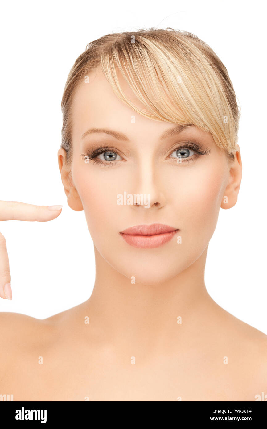 face of beautiful woman pointing at her face Stock Photo - Alamy