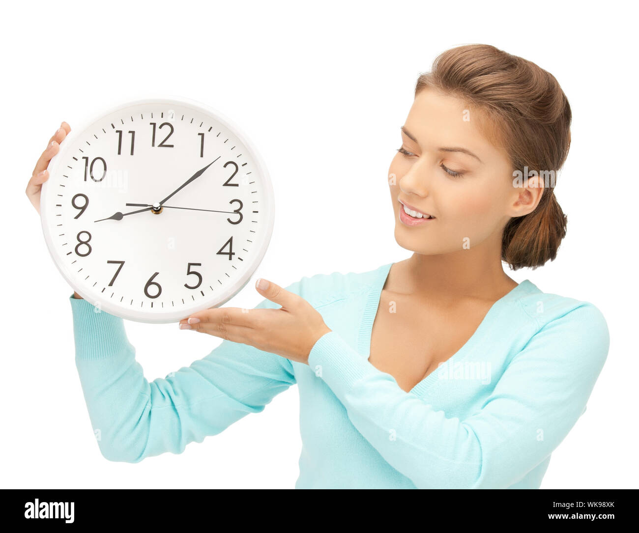 woman with wall clock Stock Photo - Alamy