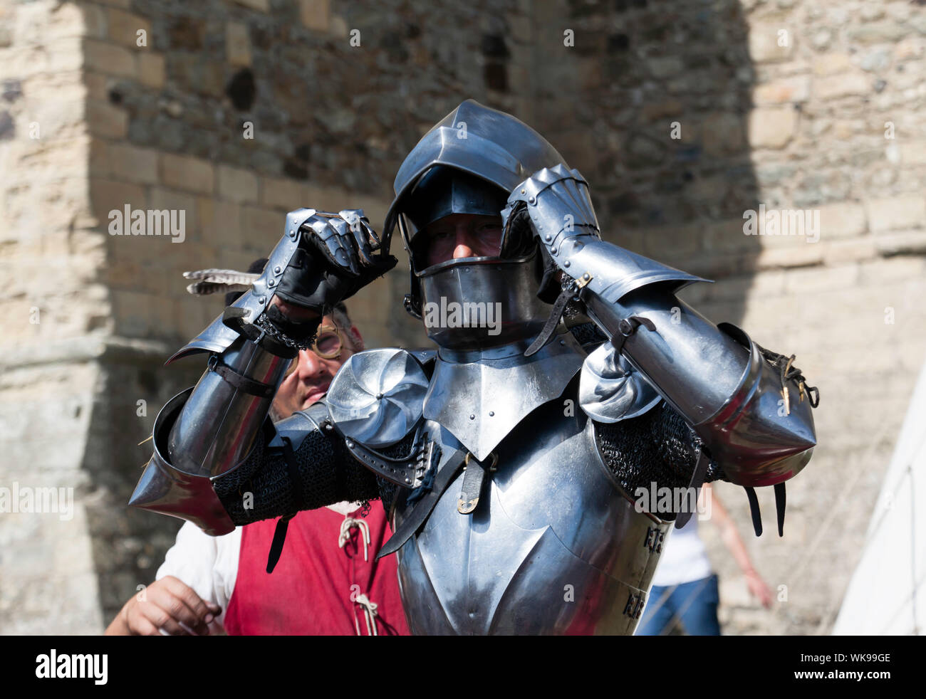 Close-up of Medieval Knights putting on their armour, prior to taking ...
