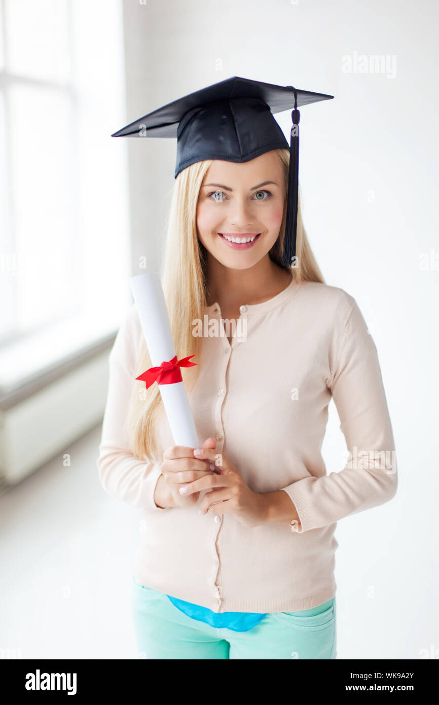 happy student in graduation cap with certificate Stock Photo - Alamy