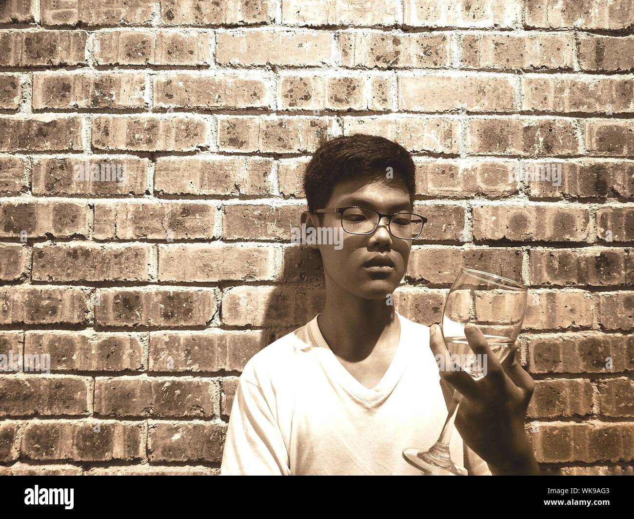 Man holding brick hi-res stock photography and images - Alamy
