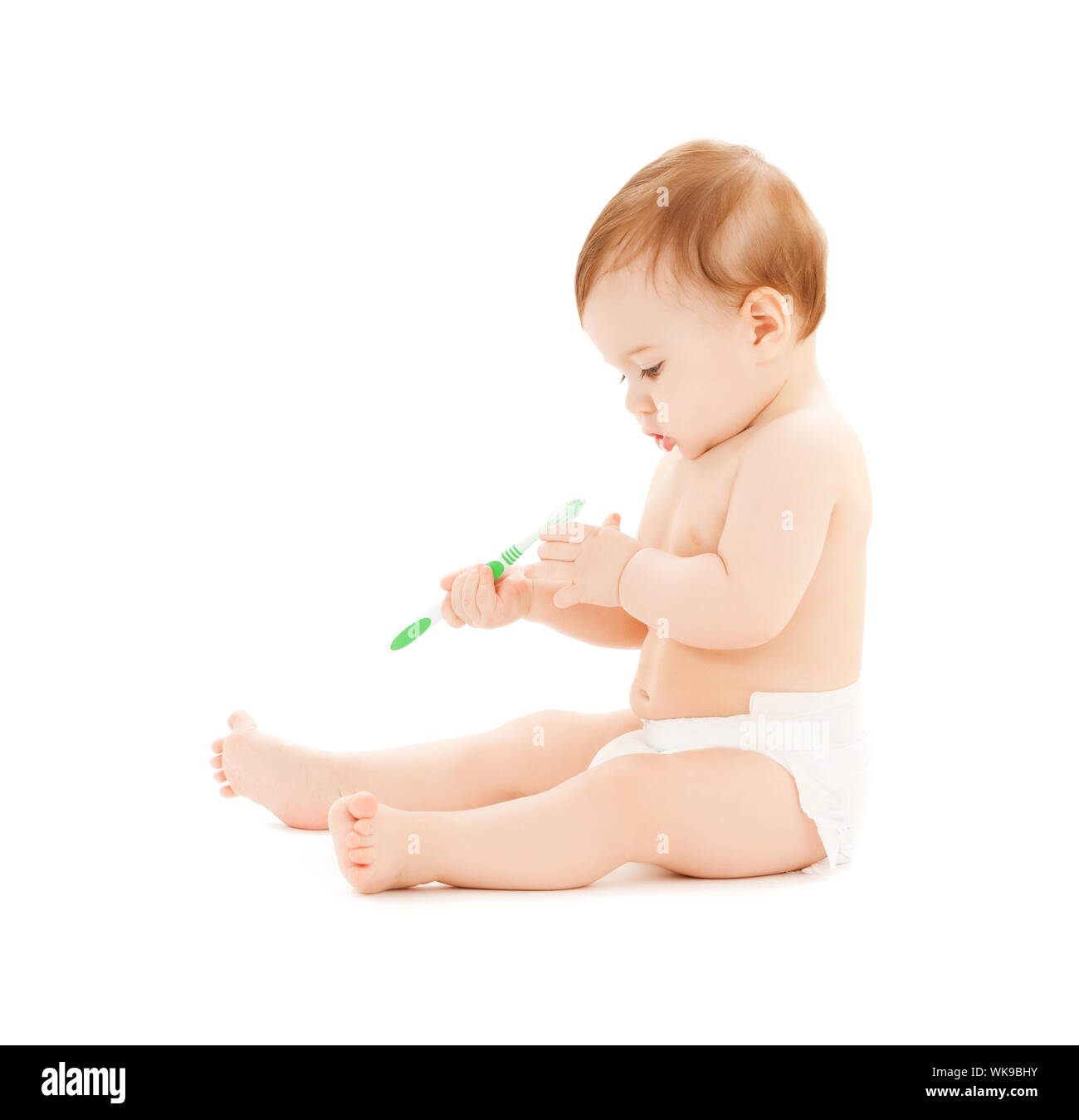 bright picture of curious baby brushing teeth Stock Photo - Alamy