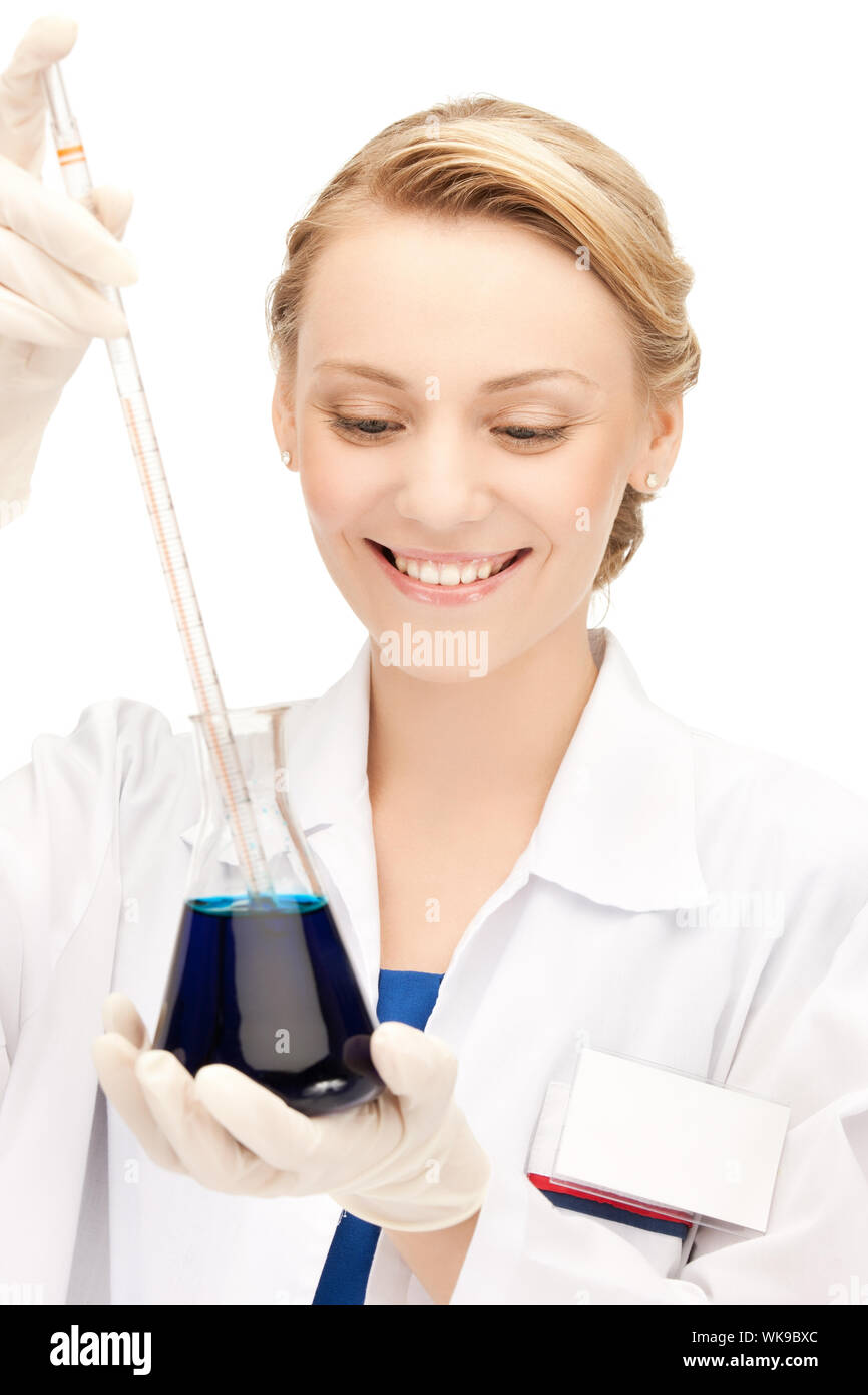 female chemist holding bulb with chemicals Stock Photo - Alamy