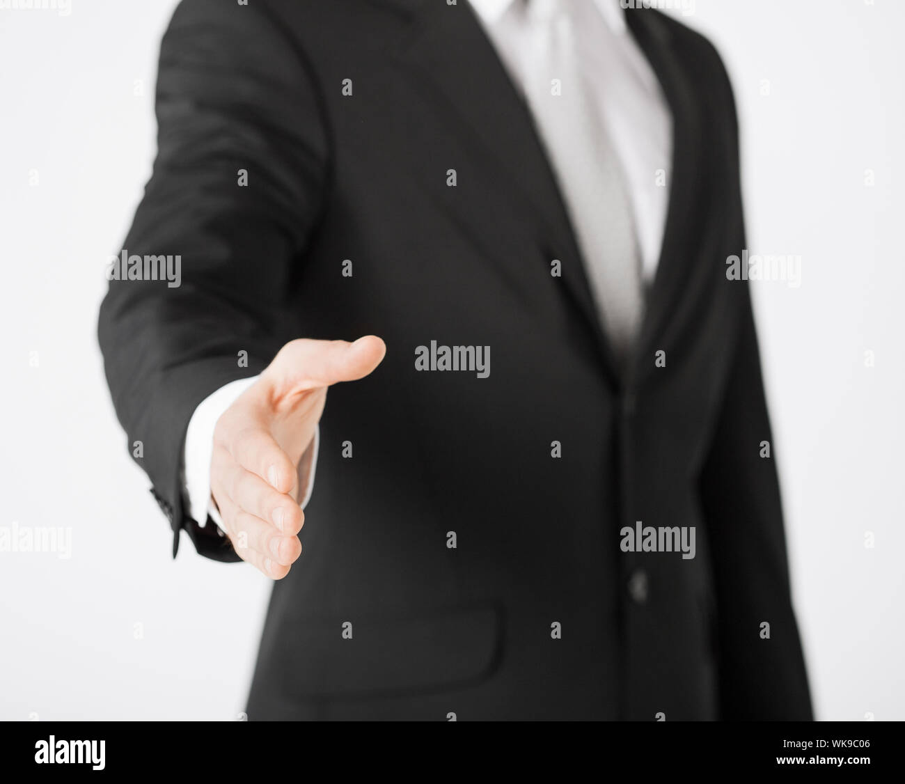businessman with open hand Stock Photo - Alamy