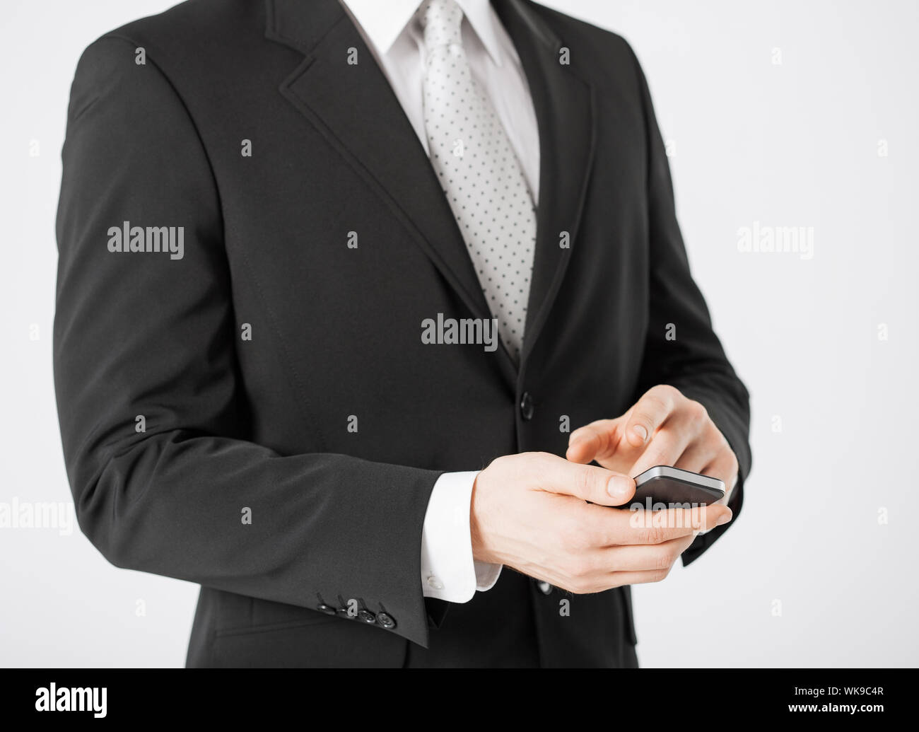 close up of man with smartphone typing something Stock Photo - Alamy