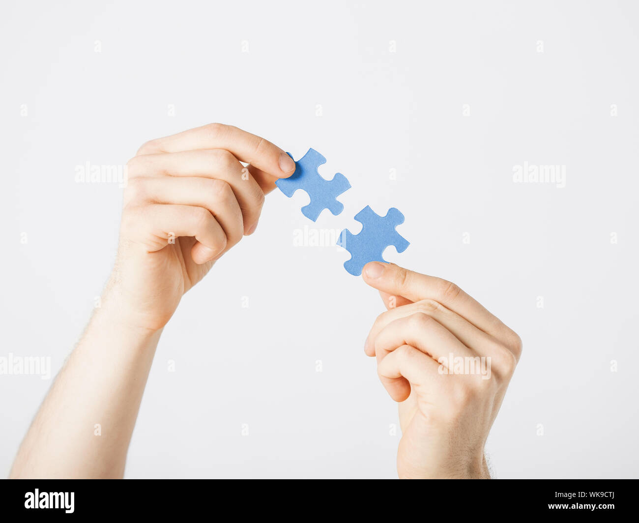 Two hands trying connect hi-res stock photography and images - Alamy