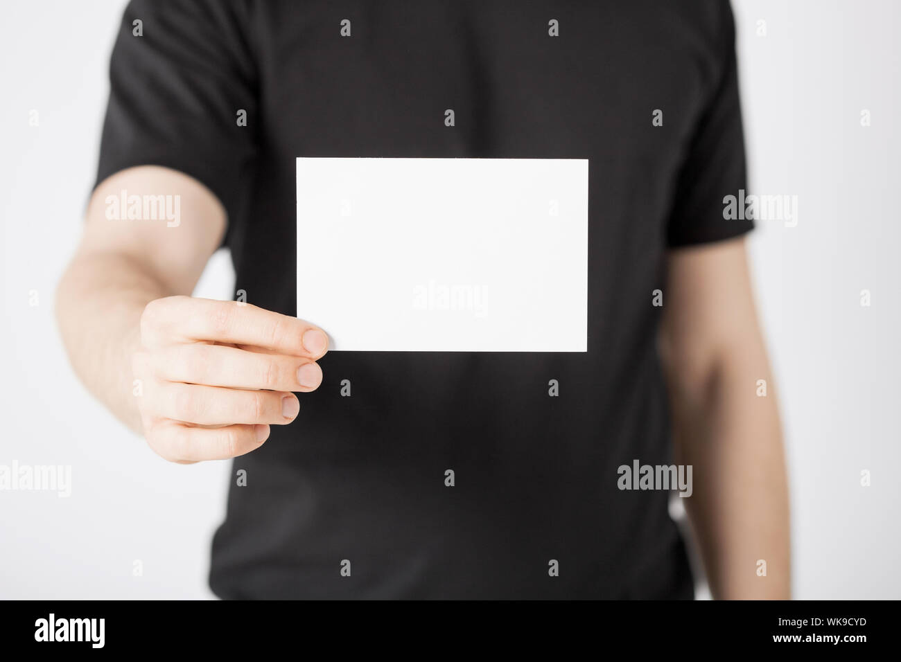 man hand with blank paper Stock Photo - Alamy
