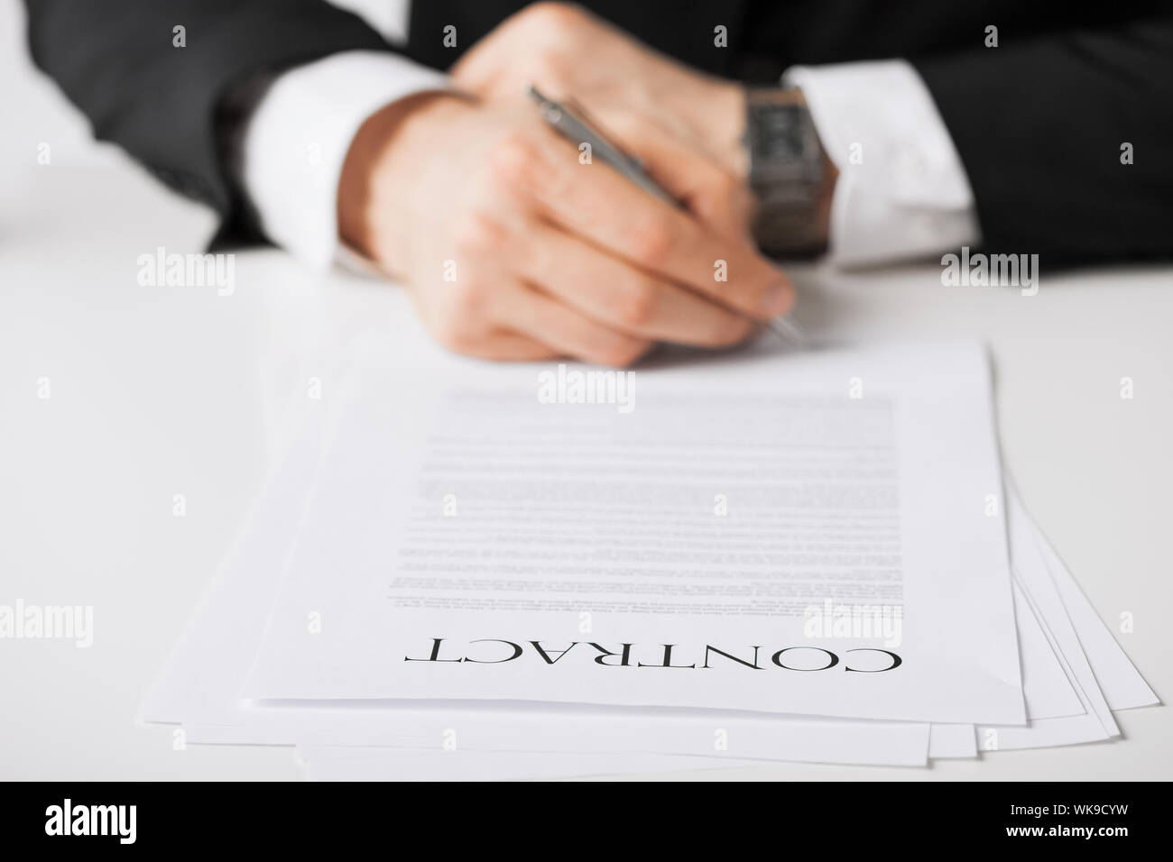 man with contract Stock Photo - Alamy