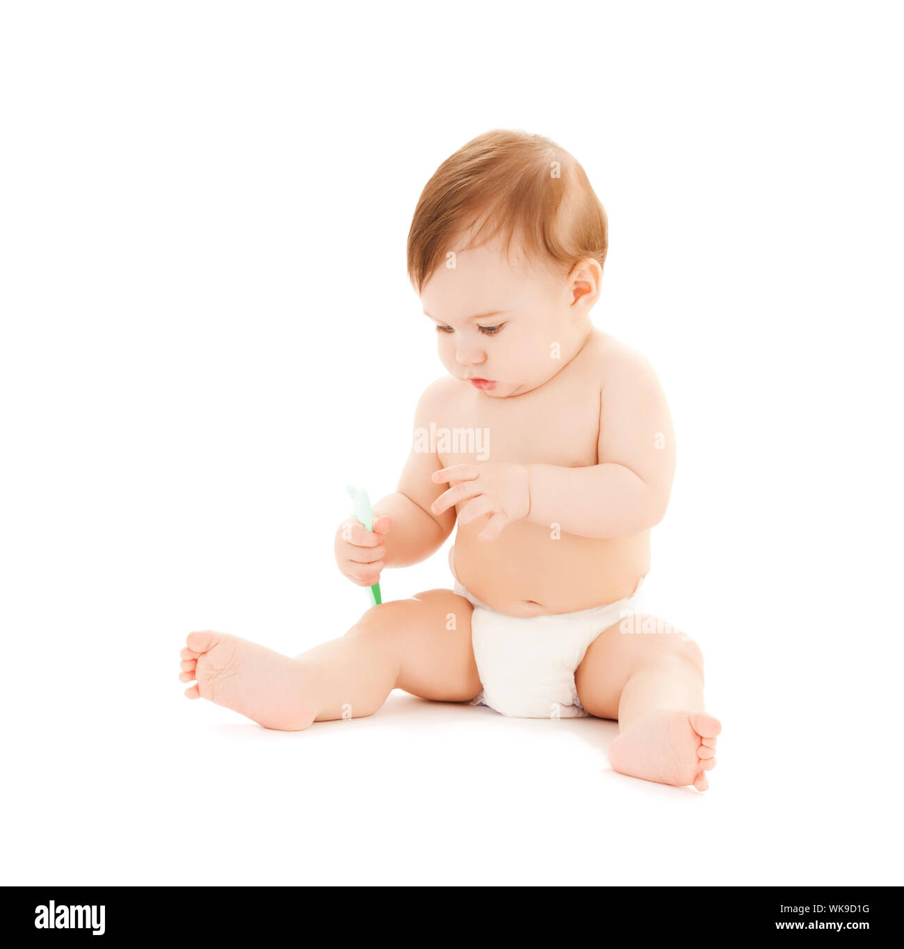 curious baby brushing teeth Stock Photo - Alamy