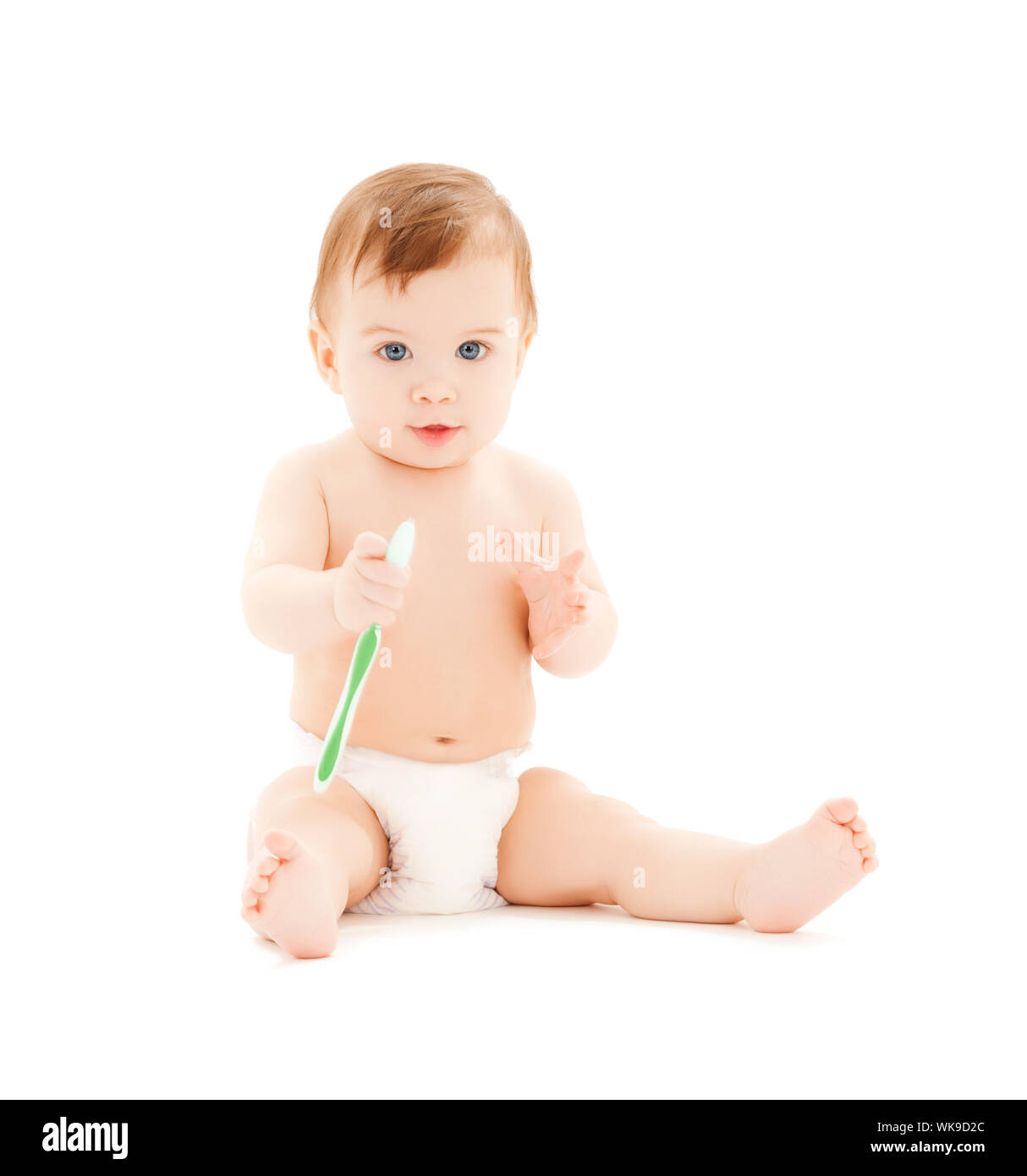 bright picture of curious baby brushing teeth Stock Photo - Alamy