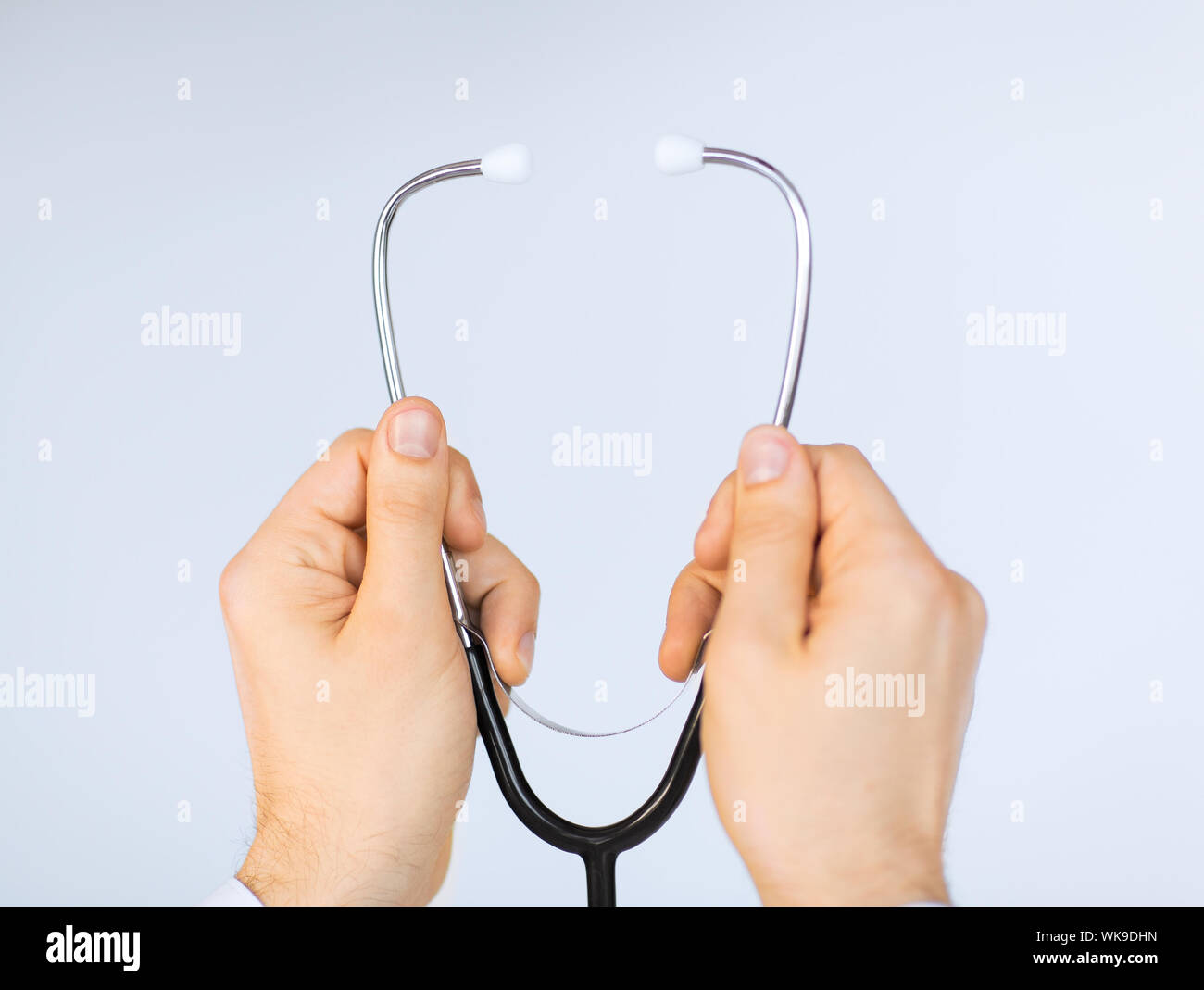 picture of doctor hands with stethoscope listening something Stock ...