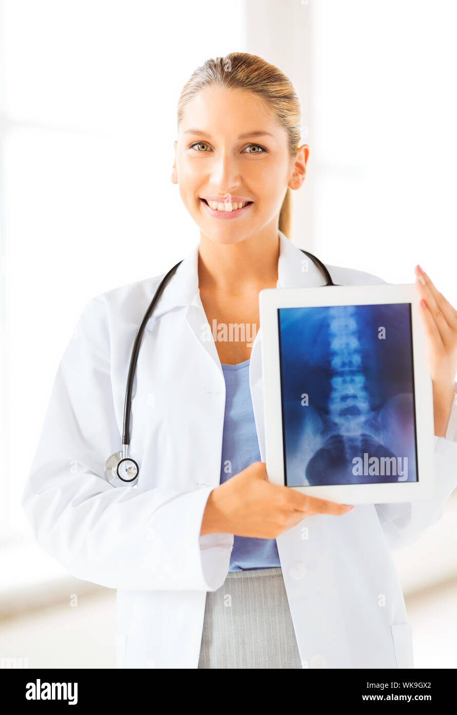 female doctor with x-ray on tablet pc Stock Photo - Alamy