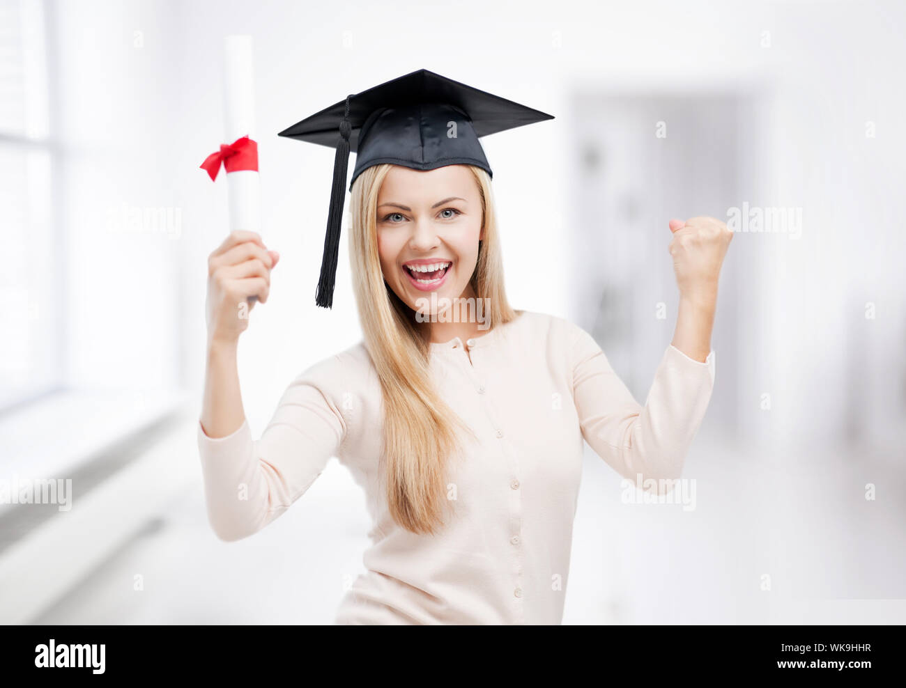 student in graduation cap with certificate Stock Photo - Alamy