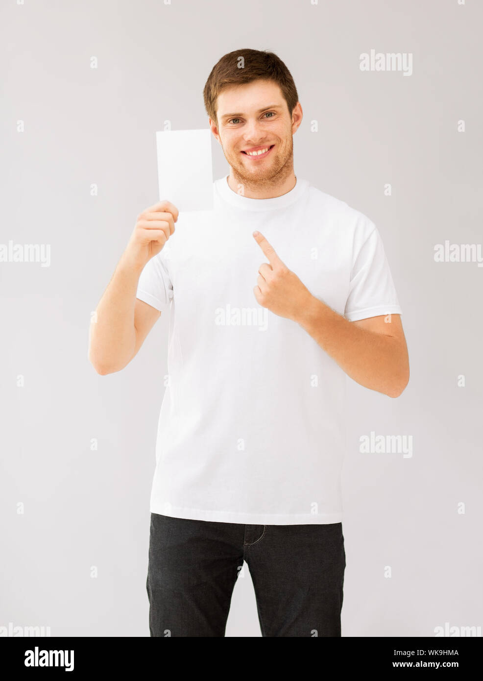 picture of man pointing at blank white paper Stock Photo - Alamy