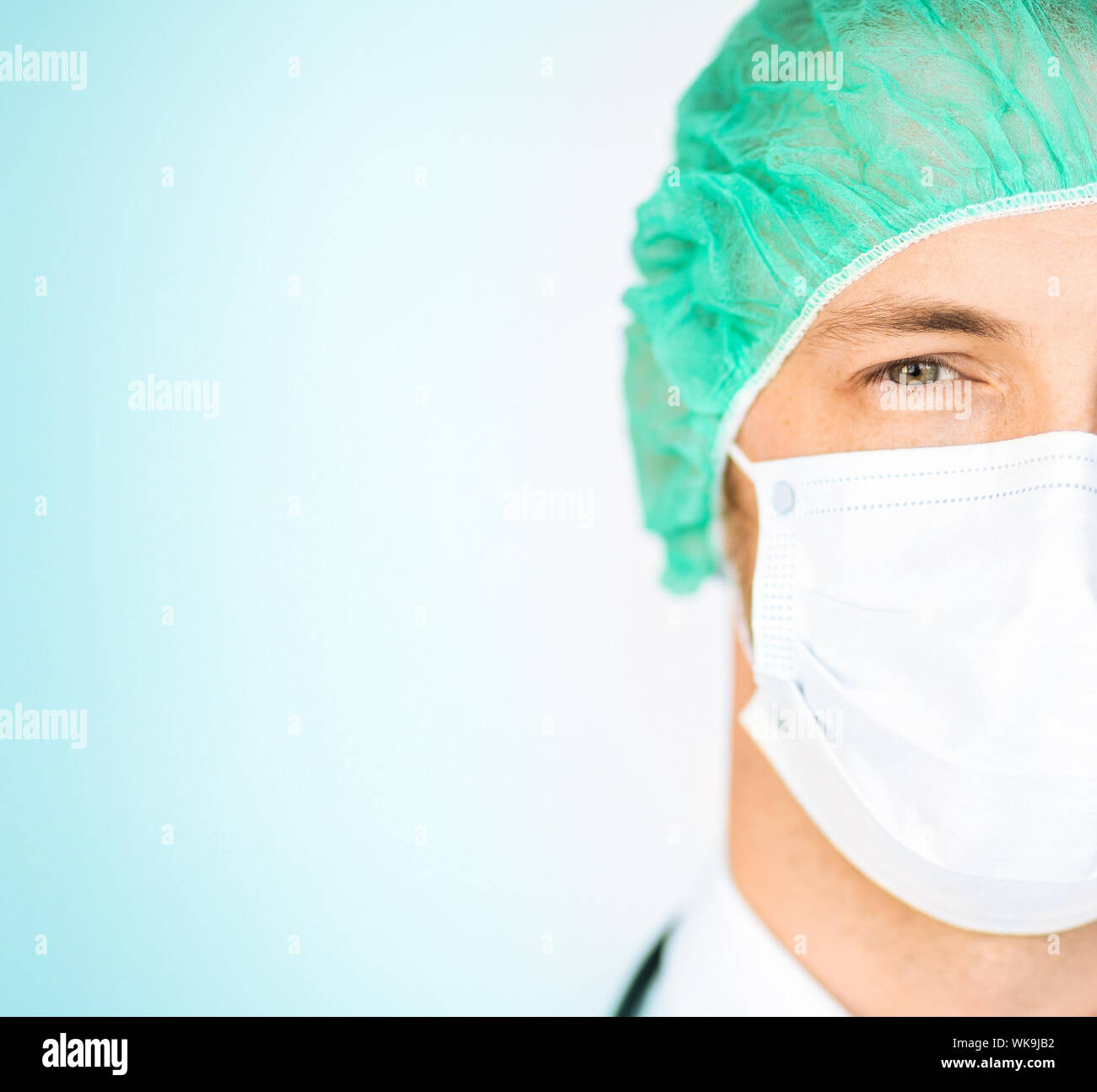 surgeon in medical cap and mask Stock Photo - Alamy