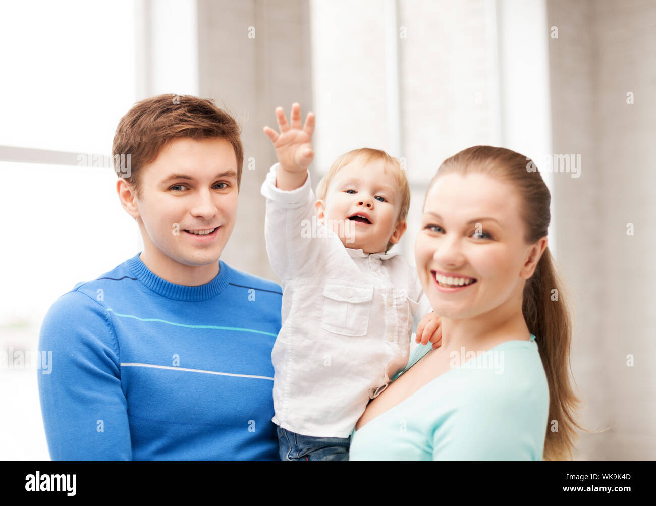 happy family with adorable baby Stock Photo - Alamy