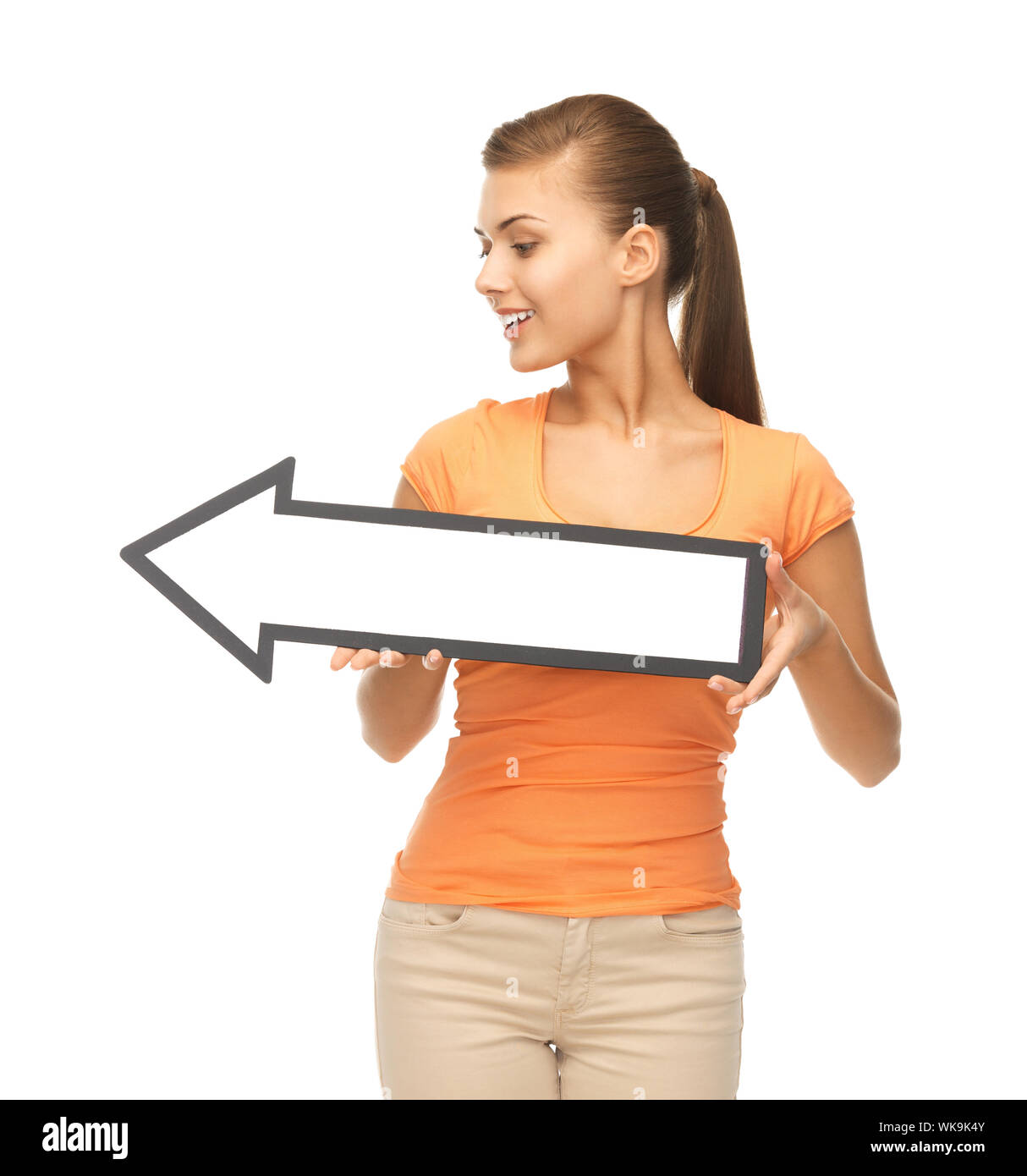 girl with direction arrow sign Stock Photo - Alamy