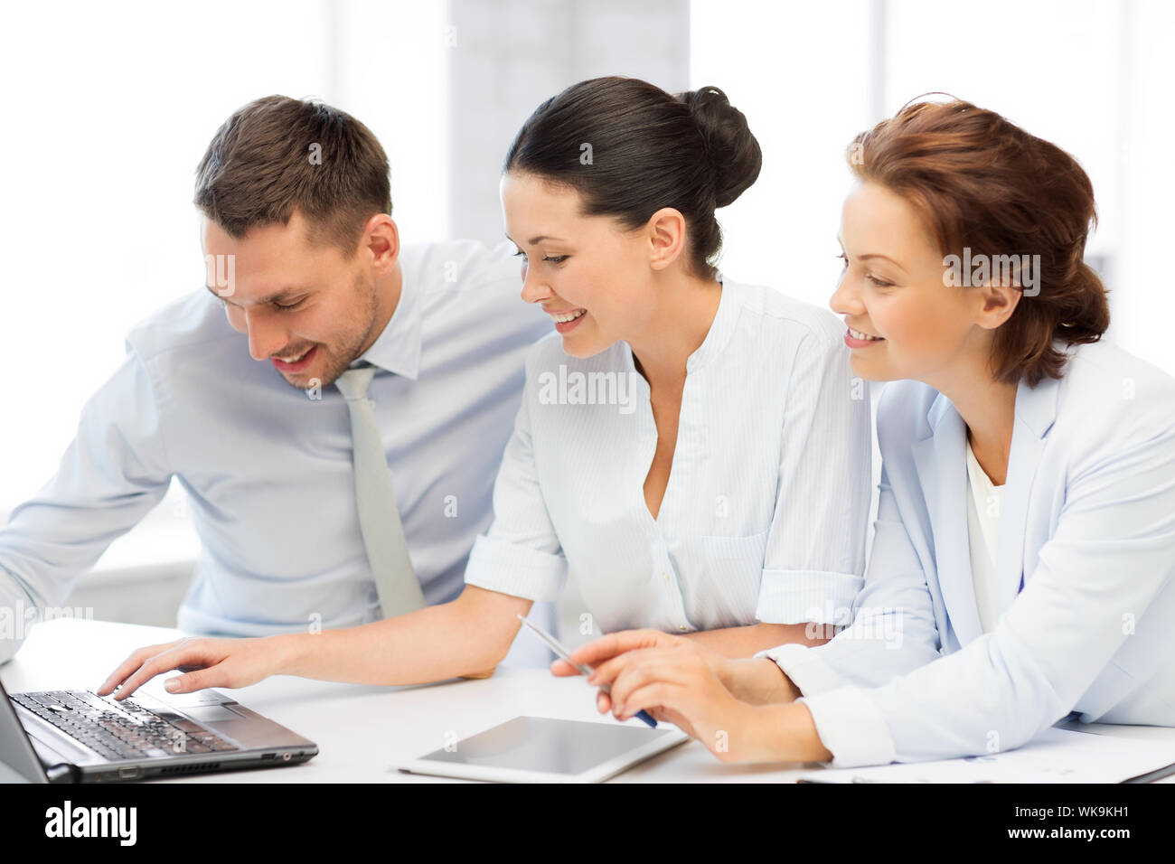 business team working in office Stock Photo - Alamy