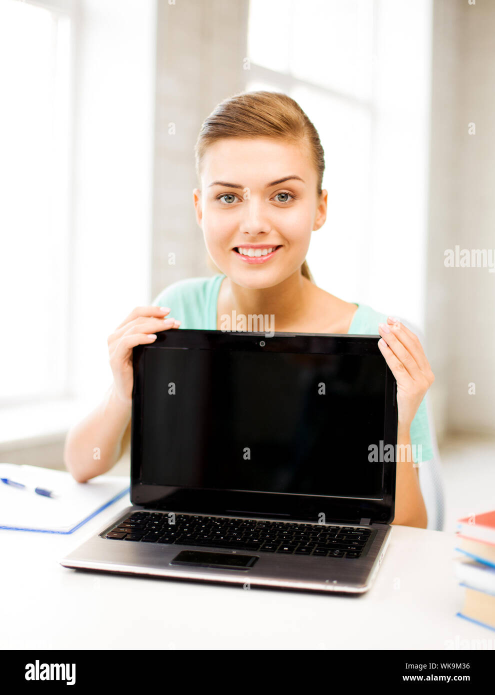 picture of smiling student girl with laptop at school Stock Photo - Alamy