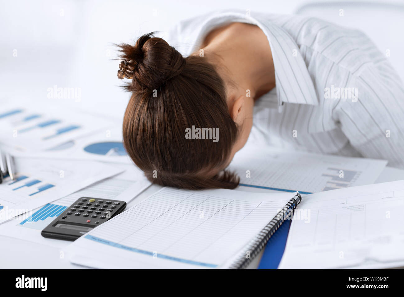picture of woman sleeping at work in funny pose Stock Photo - Alamy