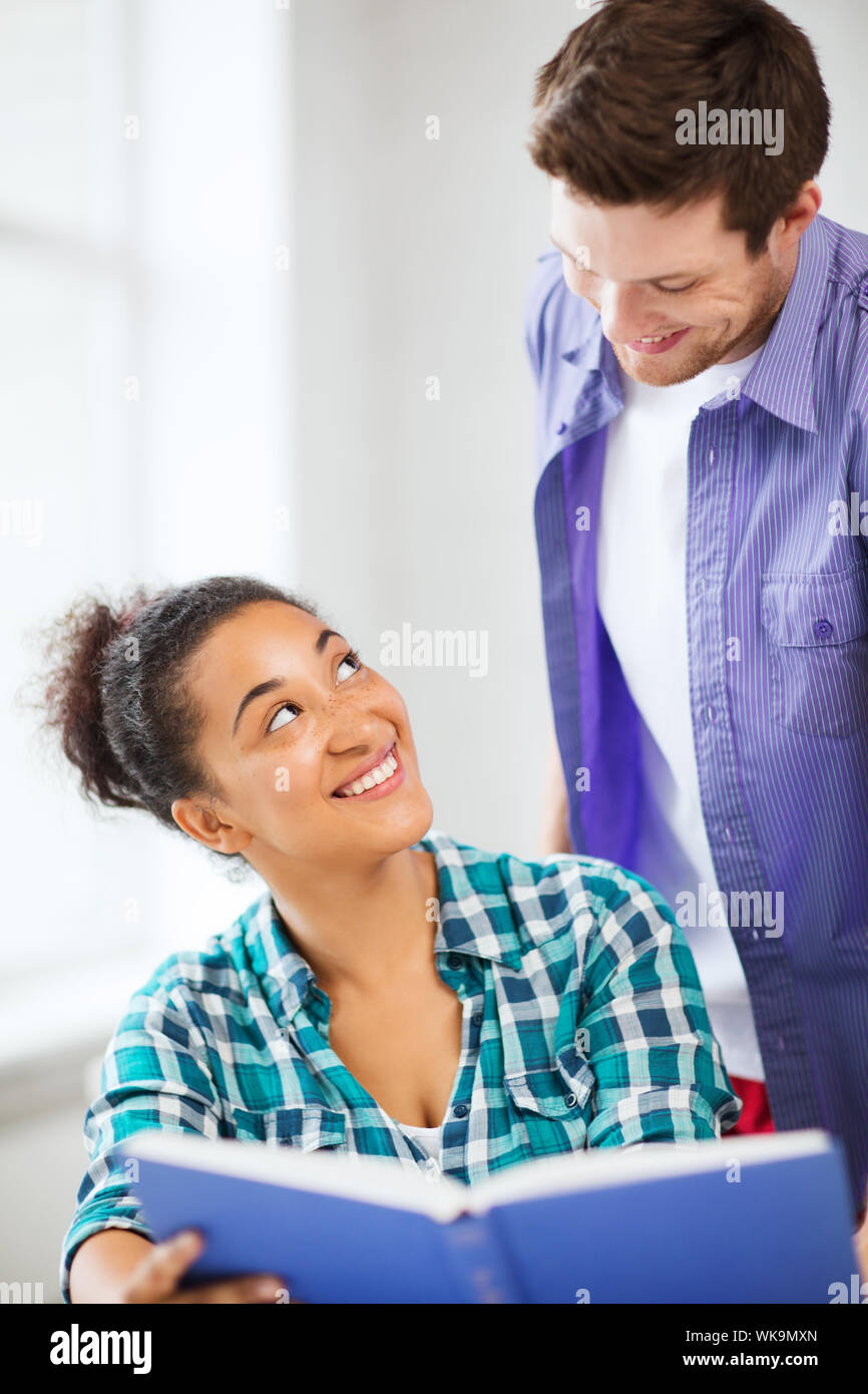 Students reading together african teens hi-res stock photography and ...