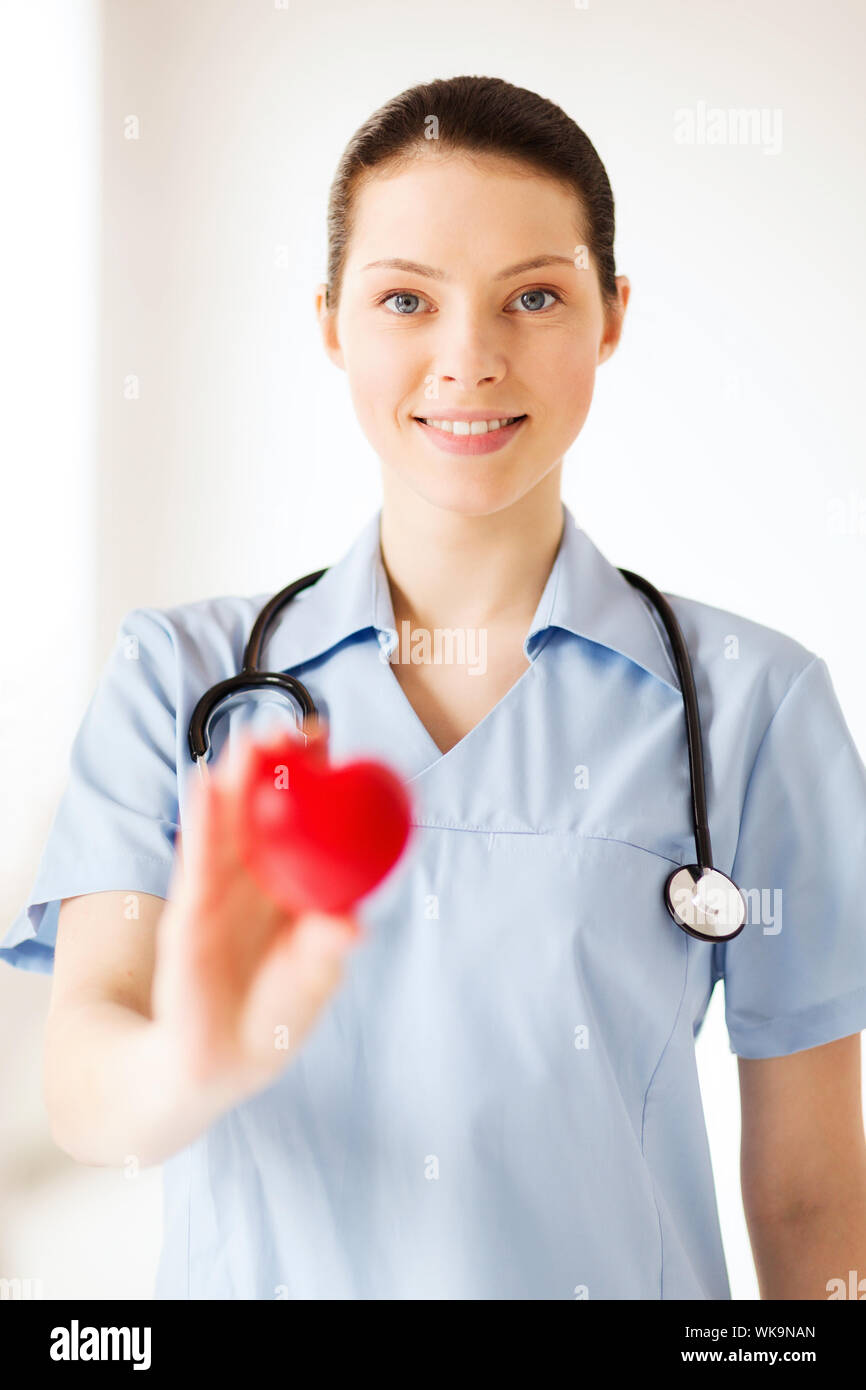 female doctor with heart Stock Photo - Alamy