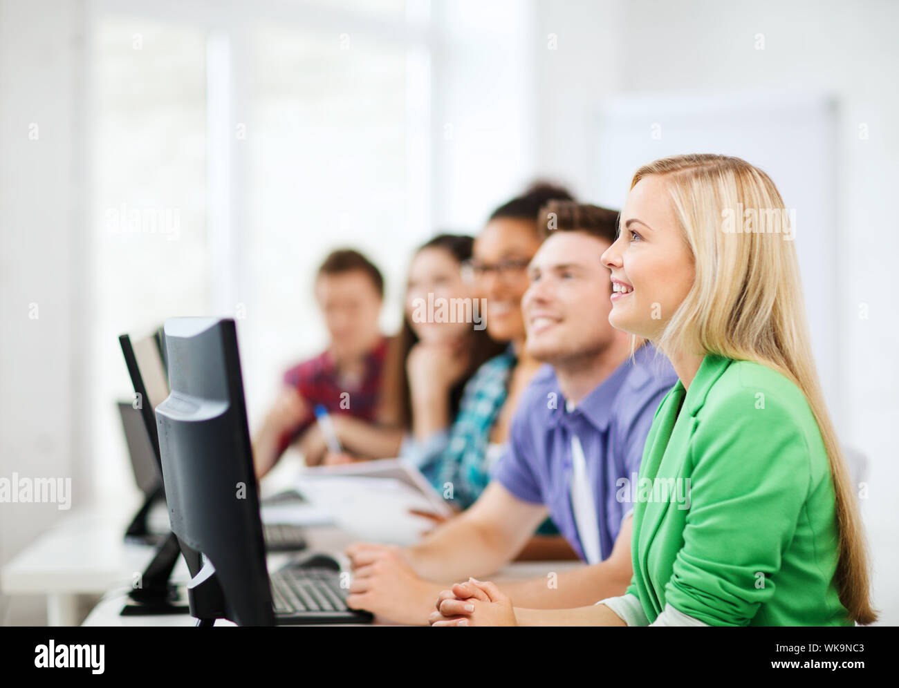 students with computers studying at school Stock Photo - Alamy