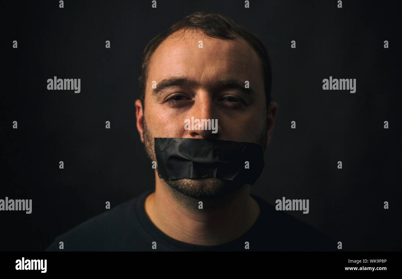 Man with tape hi-res stock photography and images - Alamy