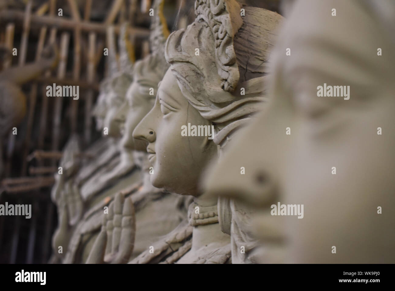 Clay idols of Durga under preparation before festival,Artist is busy to ...