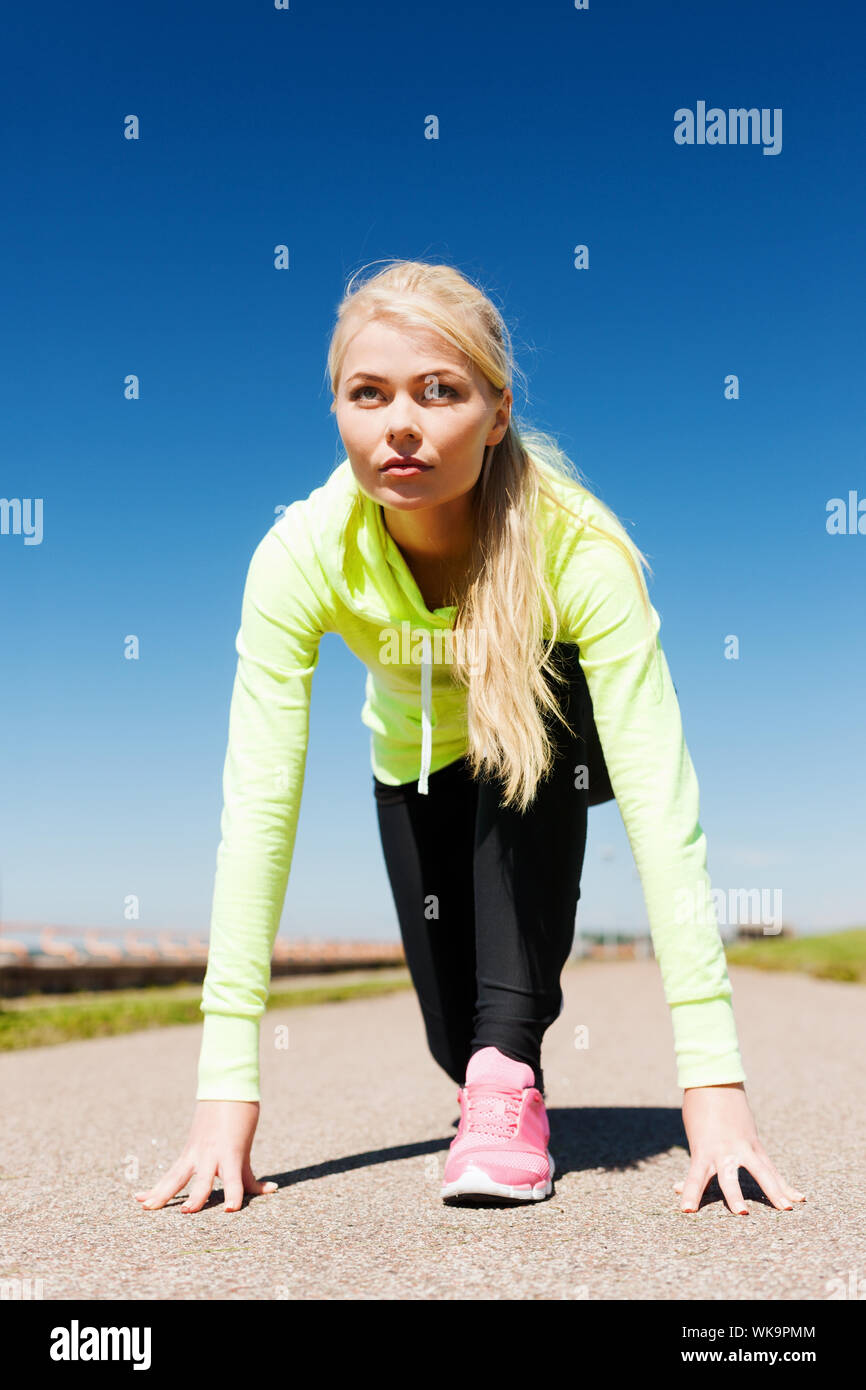 sport and lifestyle concept - woman doing running outdoors Stock Photo ...